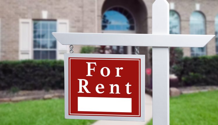 Home for rent. Sign in front of new home. - Building